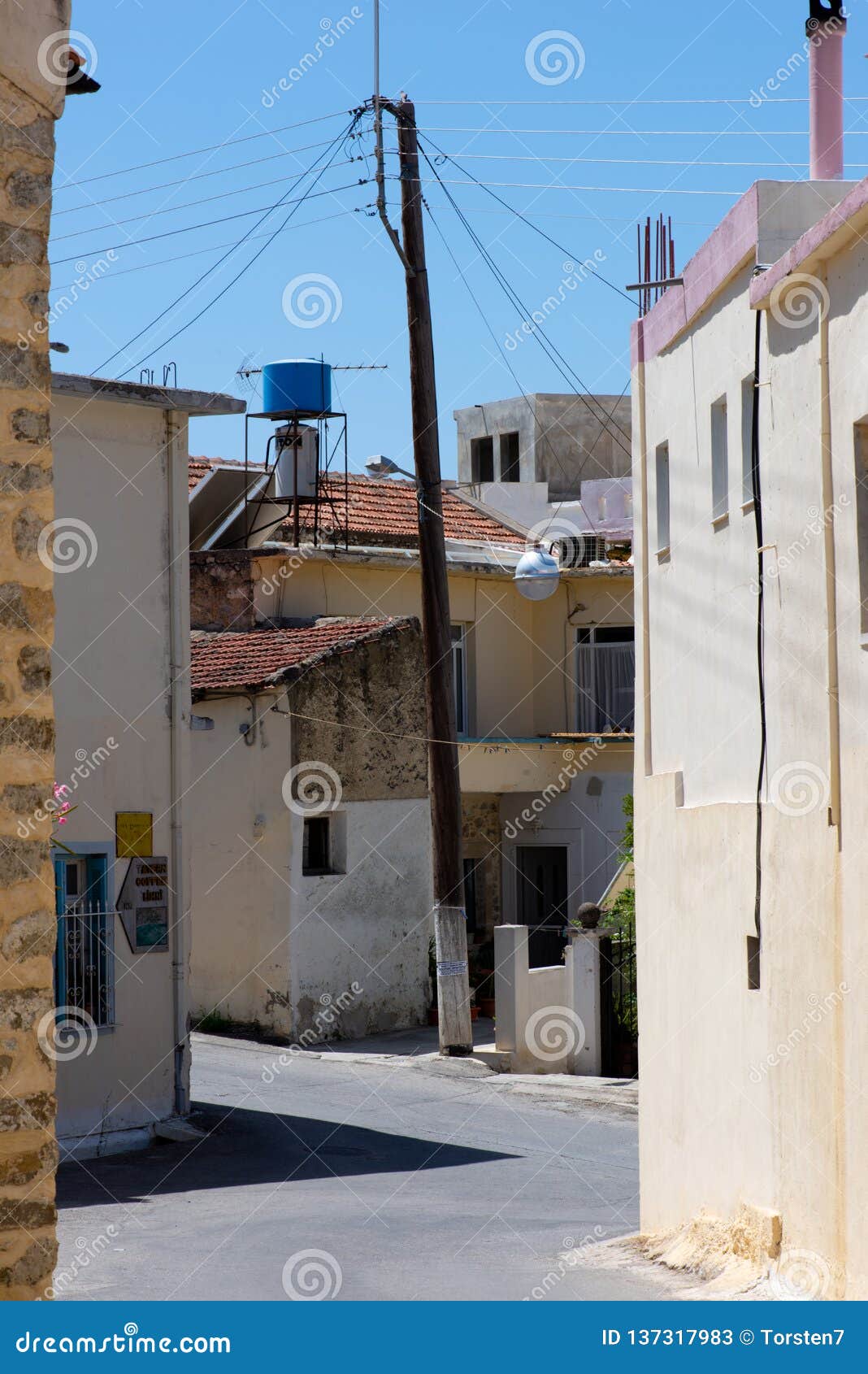 Labyrinthine Streets in Zarros with Electricity Pole Stock Image ...