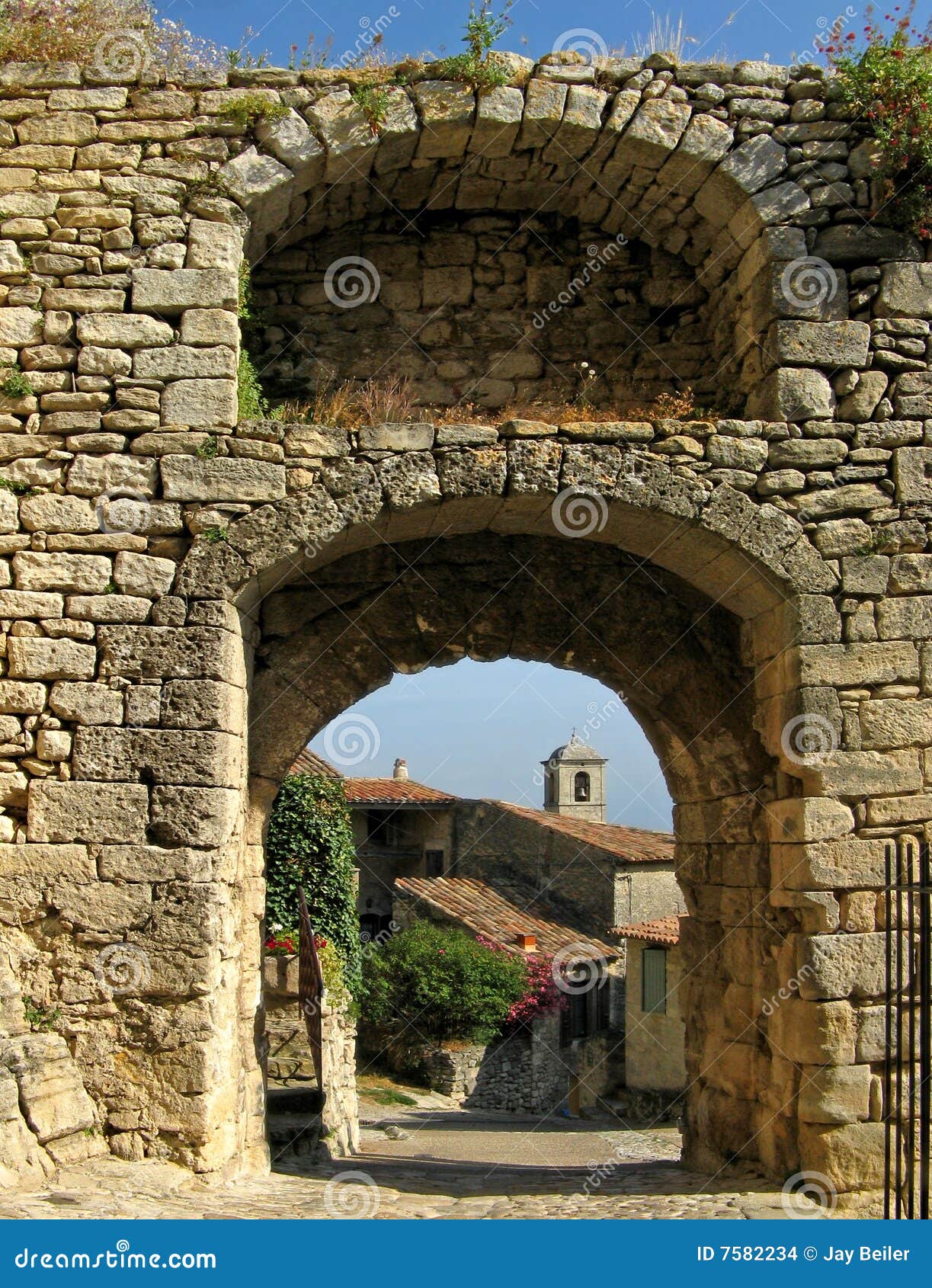 Lacoste, France, through Archway Stock Photo - Image of stonework ...