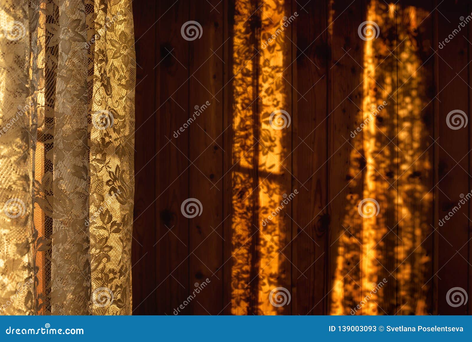 Lacy Curtain with Floral Pattern and a Lacy Shadow. Selective Focus ...