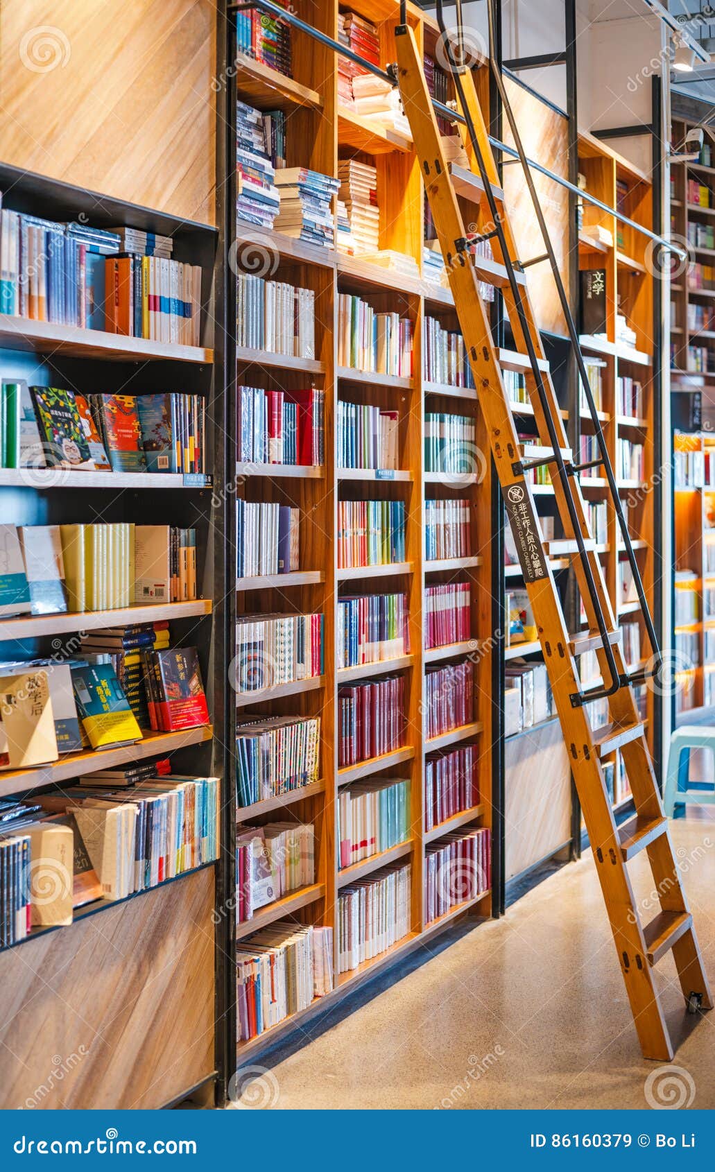 Ladder in Bookstore editorial stock image. Image of chongqing - 86160379