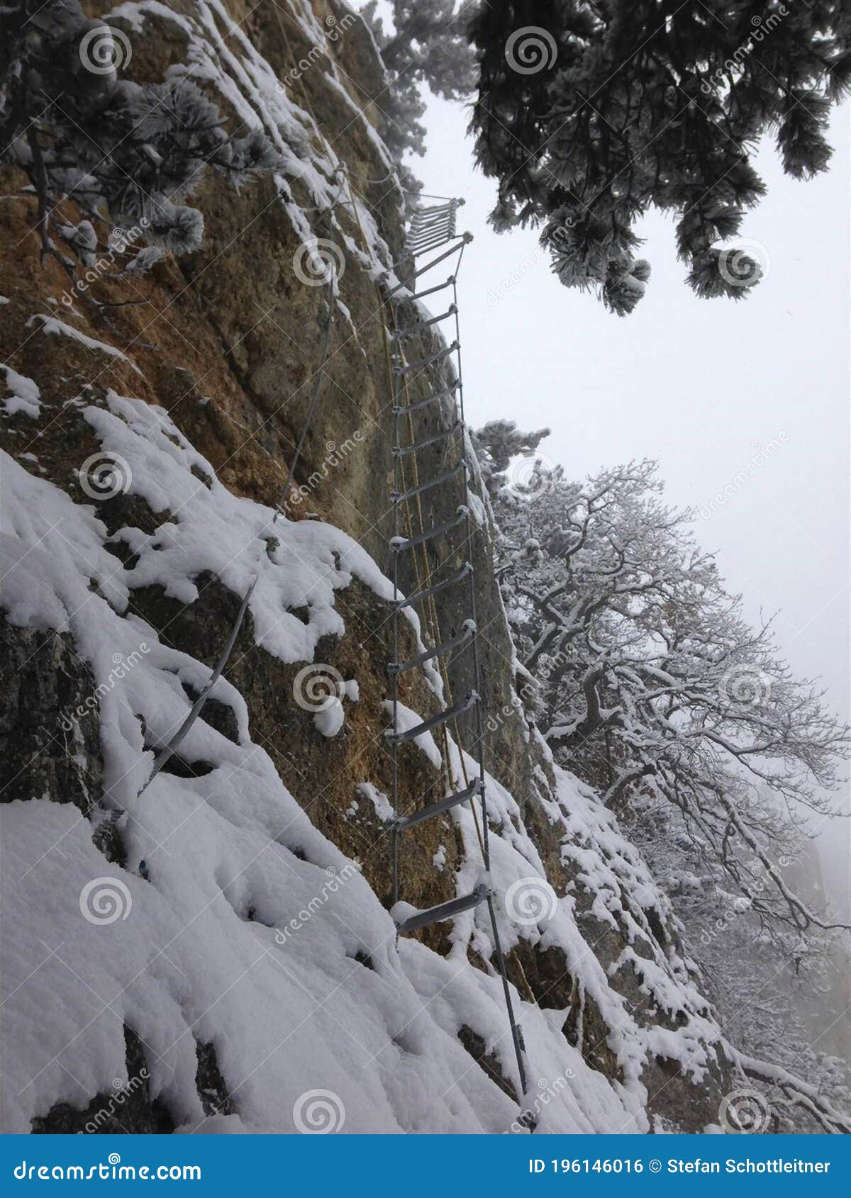 A Ladder for Climbing on the Rock Stock Photo - Image of glacier, slope ...