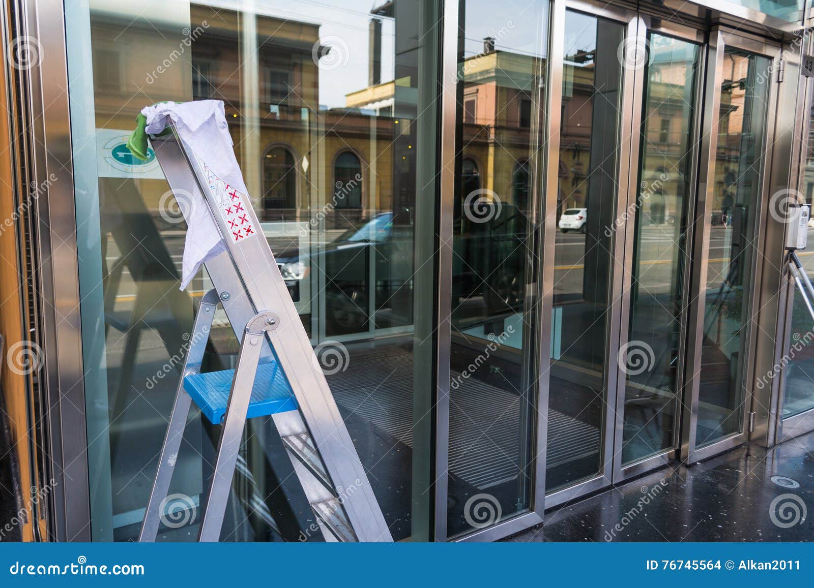 Ladder by a hotel entrance stock photo. Image of detergent - 76745564