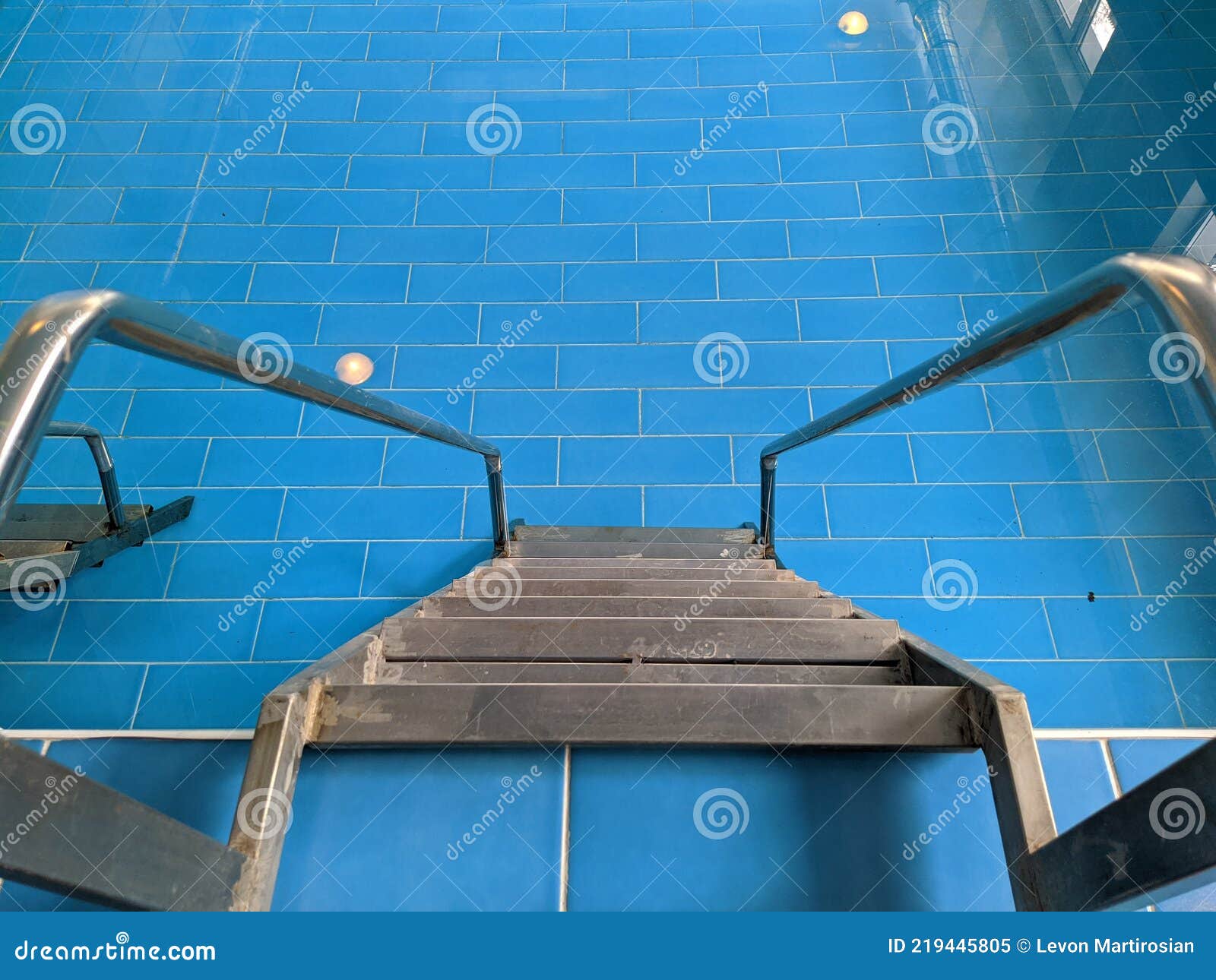 Ladder Leading into the Water of a Pool Stock Image - Image of beach ...