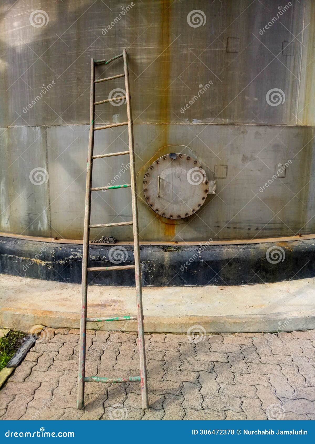 A Ladder Made Leaning on a Storage Tank Wall Stock Photo - Image of ...