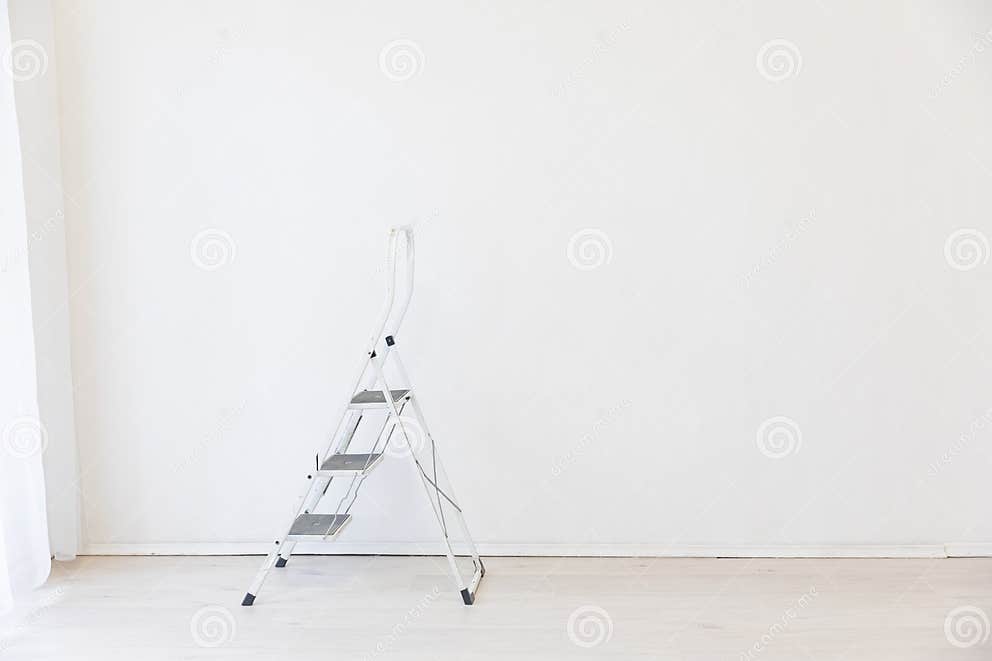 Ladder Ladder for Renovation in the Interior of an Empty White Room ...