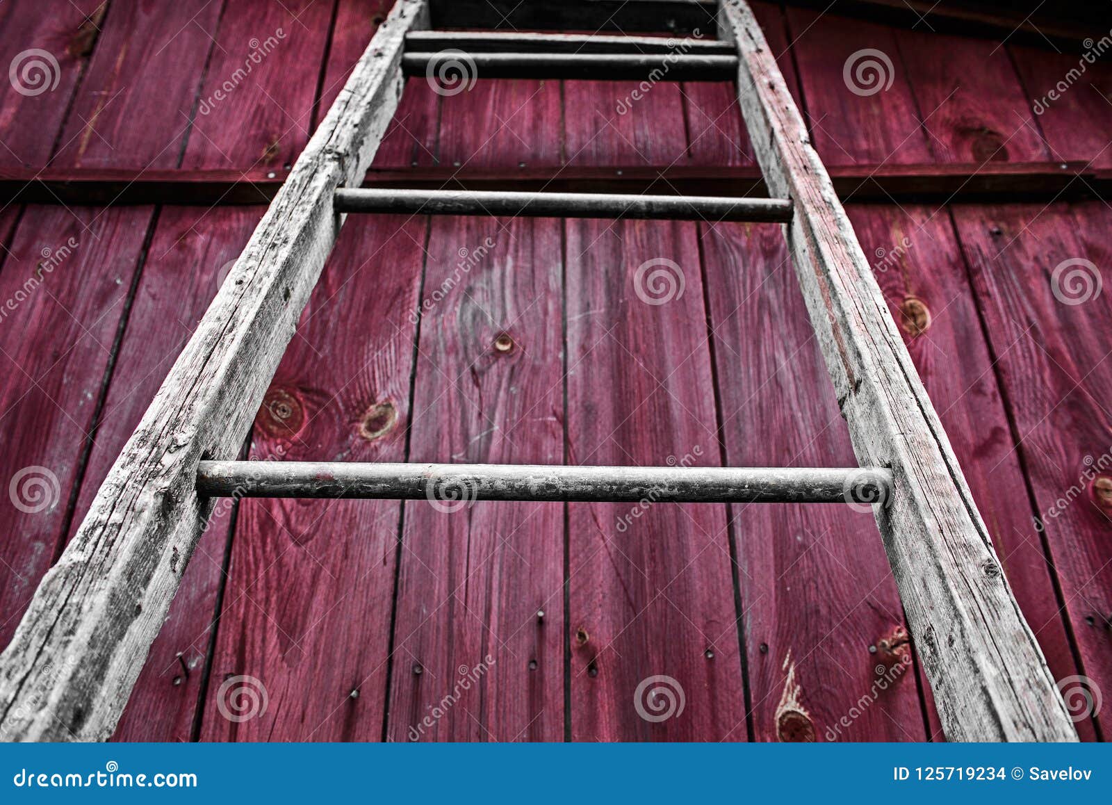 The Ladder Rests on the Wooden Red Wall Stock Photo - Image of obsolete ...