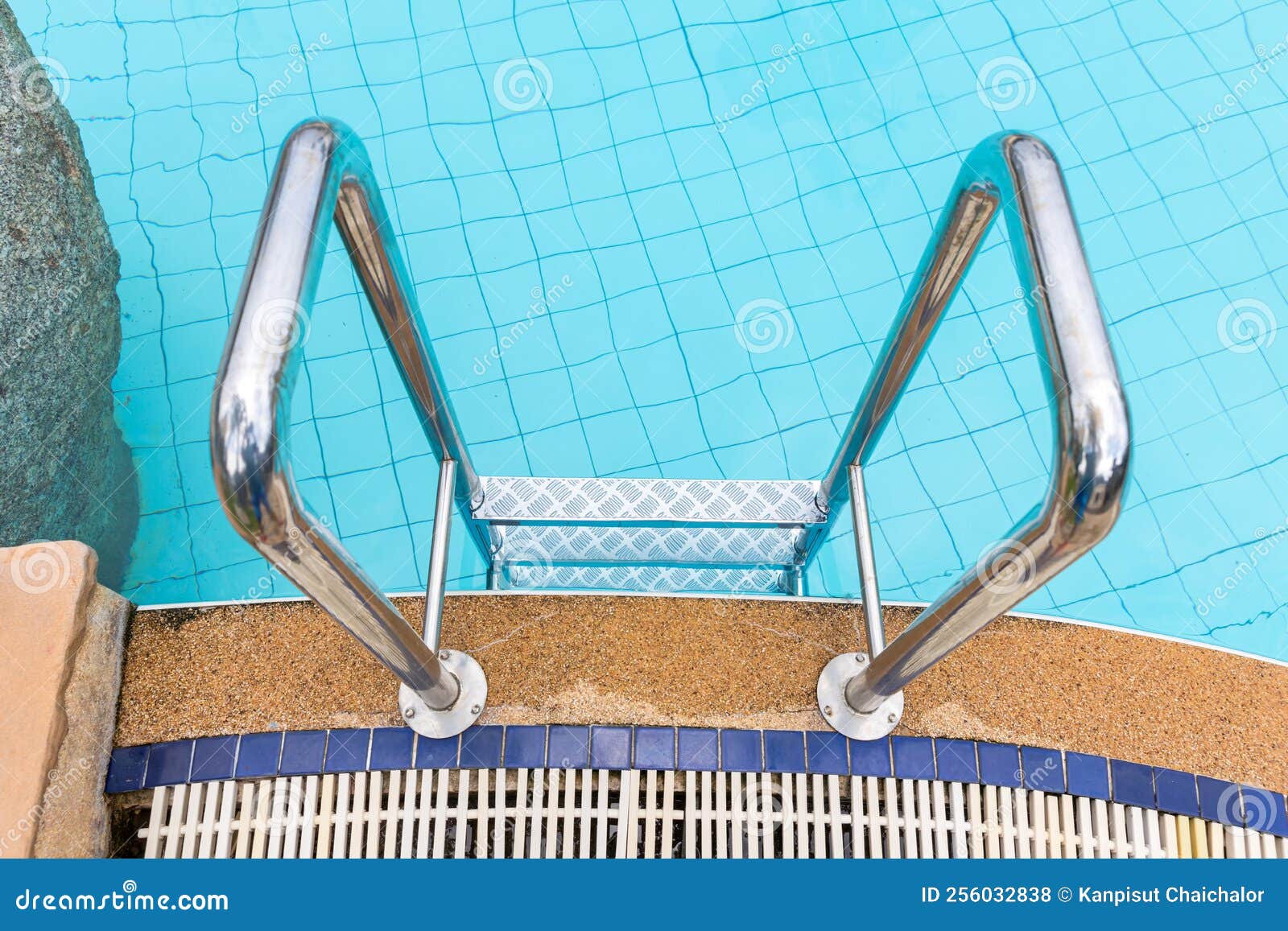 Ladder Stainless Stairs into the Swimming Pool. Stairs Swimming Pool ...