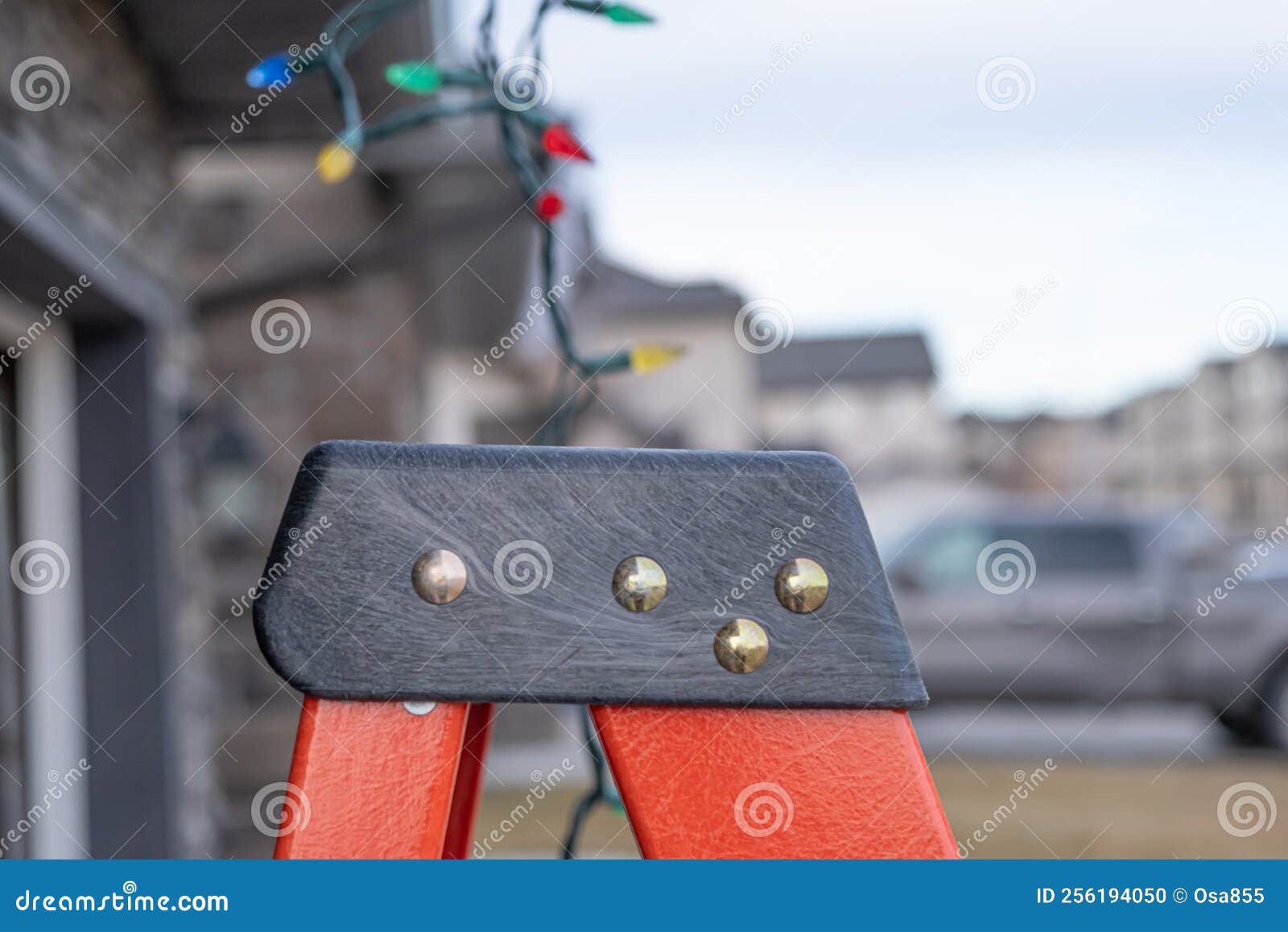 Ladder with String of Christmas Lights To Hang Up Stock Photo - Image ...