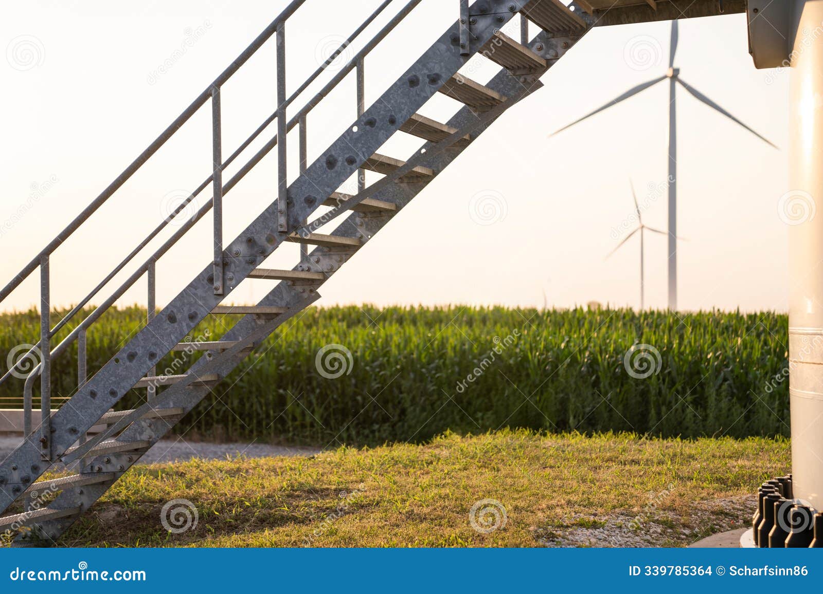 Ladder at the Wind Generator. Wind Turbines at Sunset Stock Photo ...