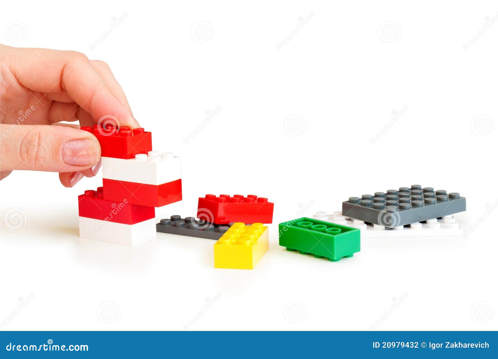 Ladrillos De Lego Con La Mano Foto de archivo - Imagen de completo ...