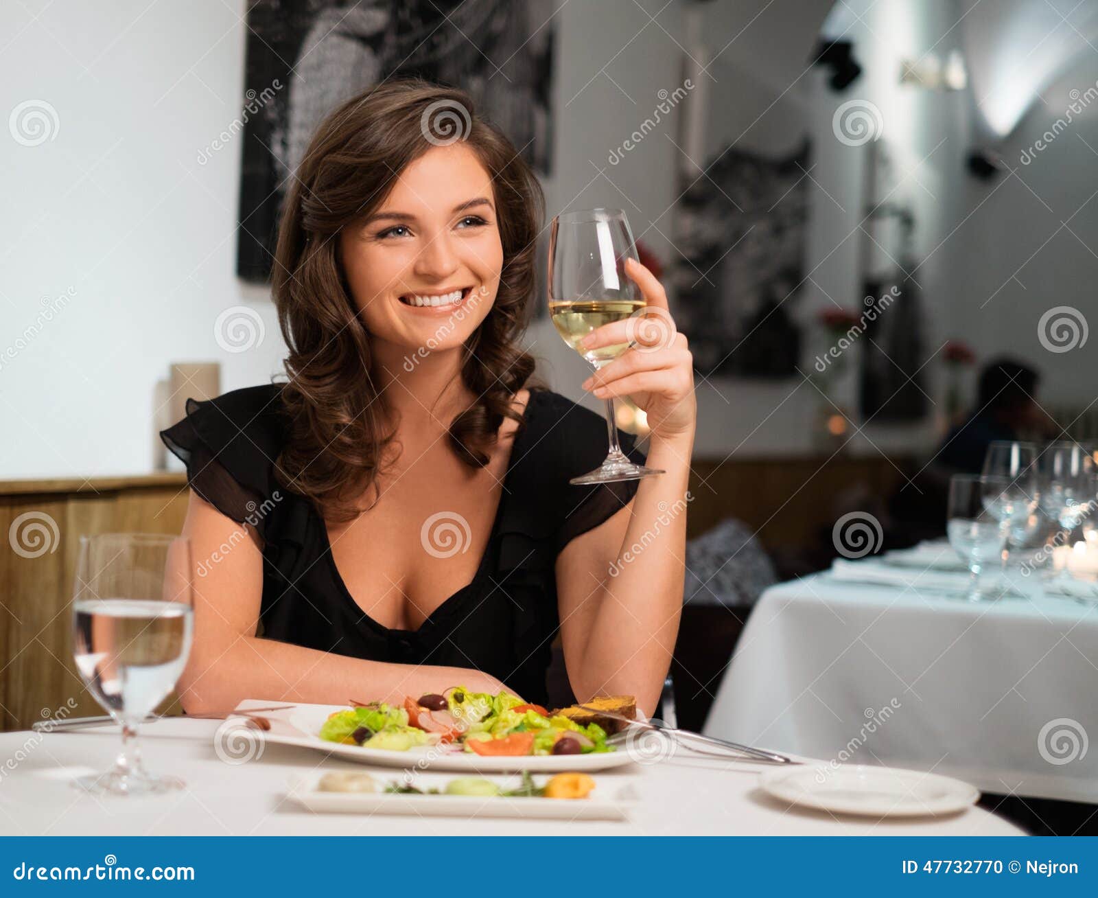 Lady alone in restaurant stock photo. Image of single - 47732770