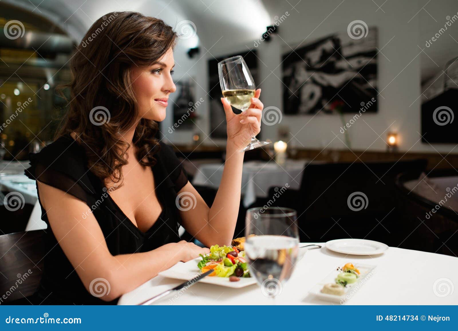 Lady alone in restaurant stock photo. Image of adult - 48214734