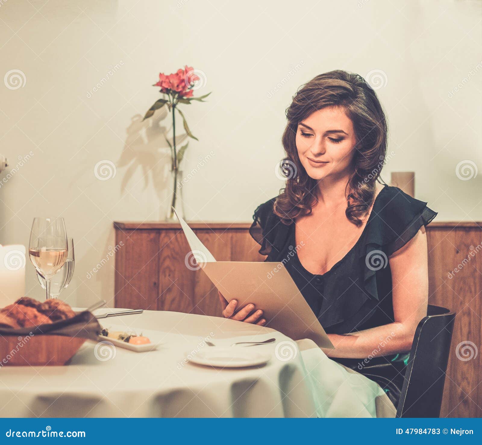 Lady alone in restaurant stock image. Image of dating - 47984783