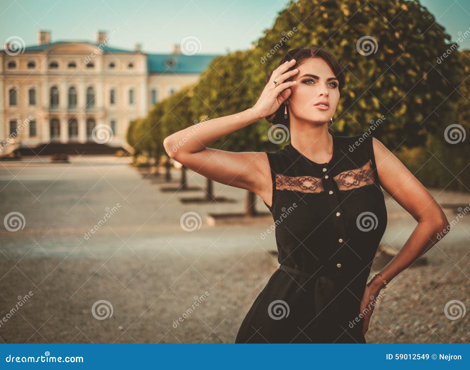 Lady in a beautiful alley stock image. Image of bowtie - 59012549
