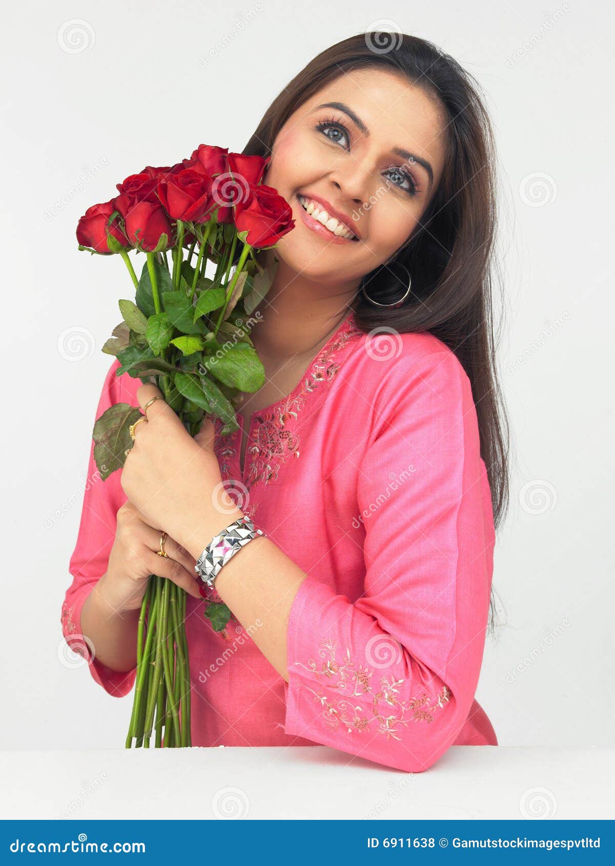 Lady with a Bouquet of Red Roses Stock Photo - Image of asian, green ...