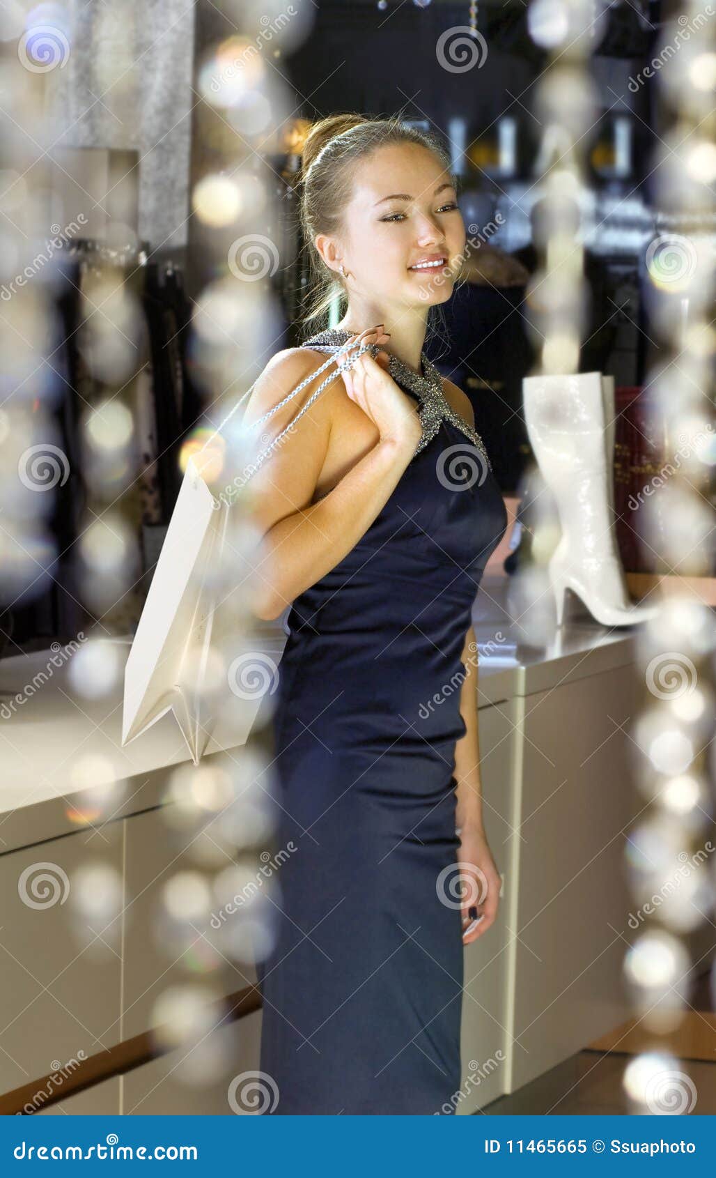 Lady in the boutique stock image. Image of mall, evening - 11465665