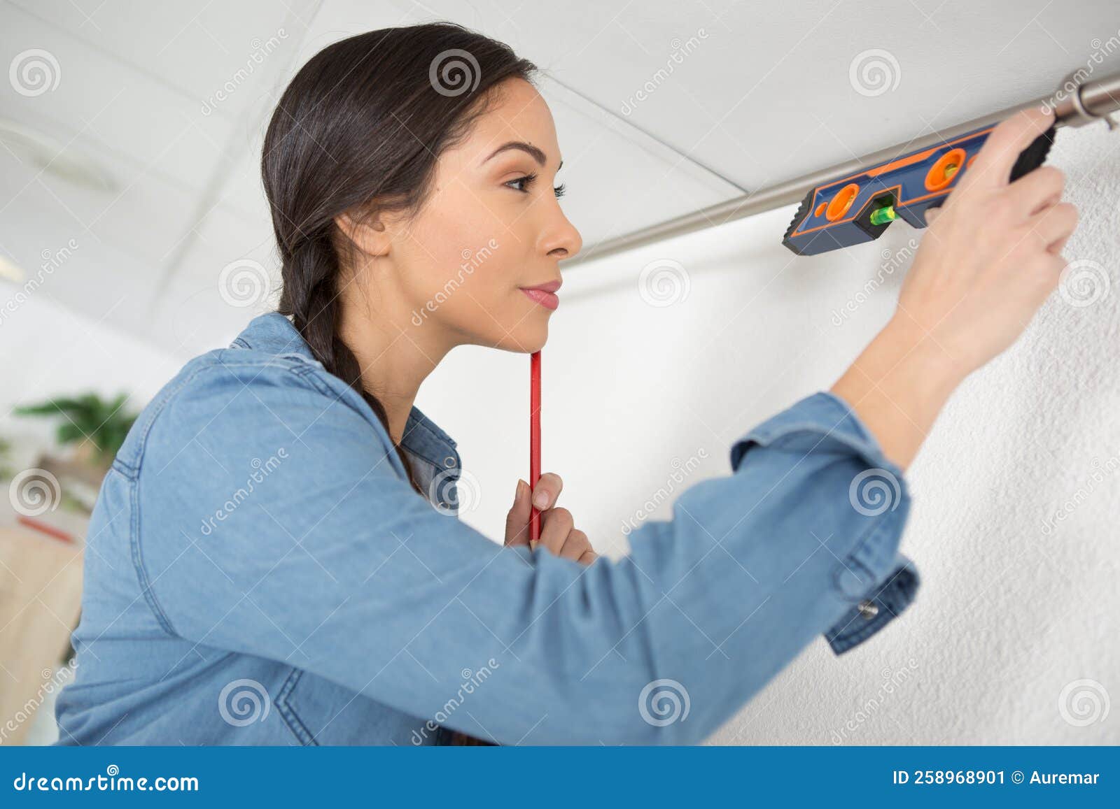 Lady Checking Curtain Rail with Spirit Level Stock Image - Image of ...
