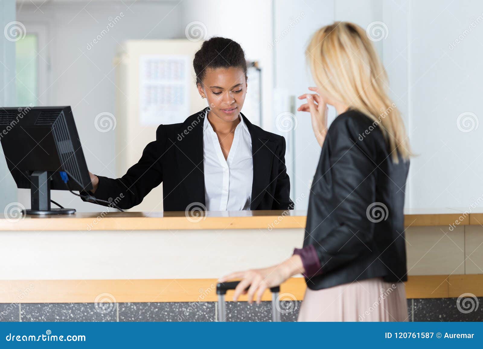Lady Checking in at Hotel Reception Stock Image - Image of ...