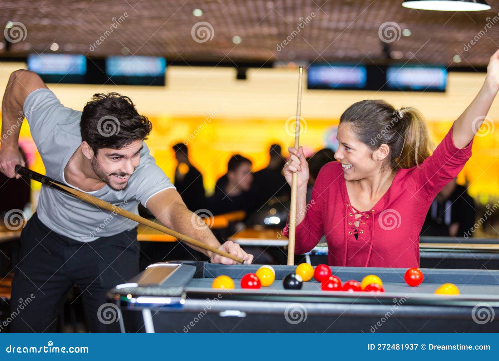 Lady Cheering As Partner Takes Shot at Pool Table Stock Image - Image ...