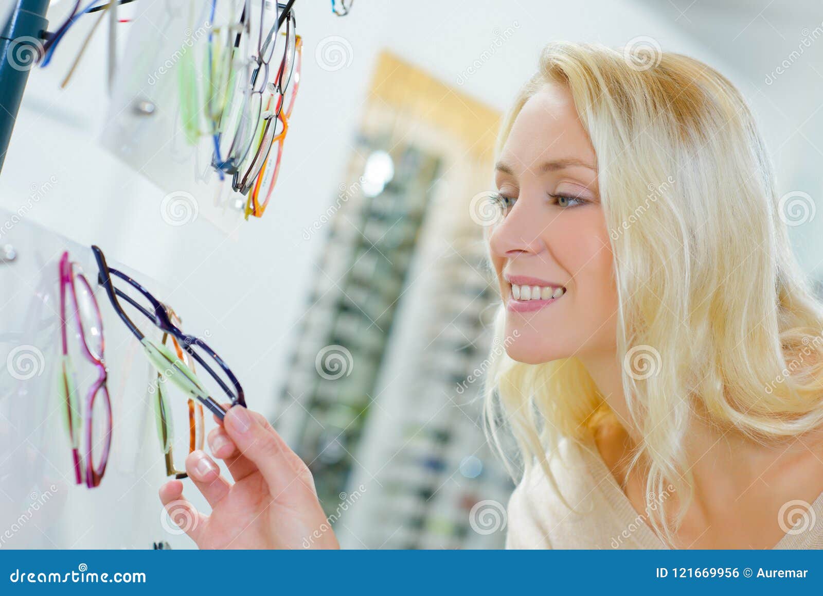 Lady Choosing Spectacles in Opticians Stock Photo - Image of modern ...