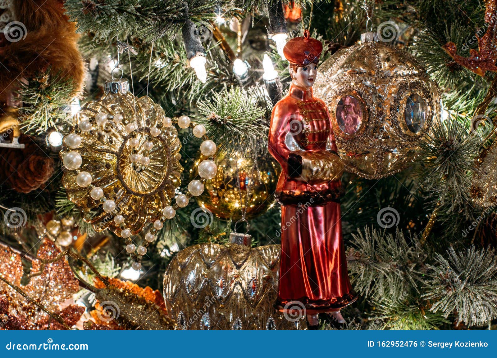 Lady on the Christmas tree stock photo. Image of gift - 162952476