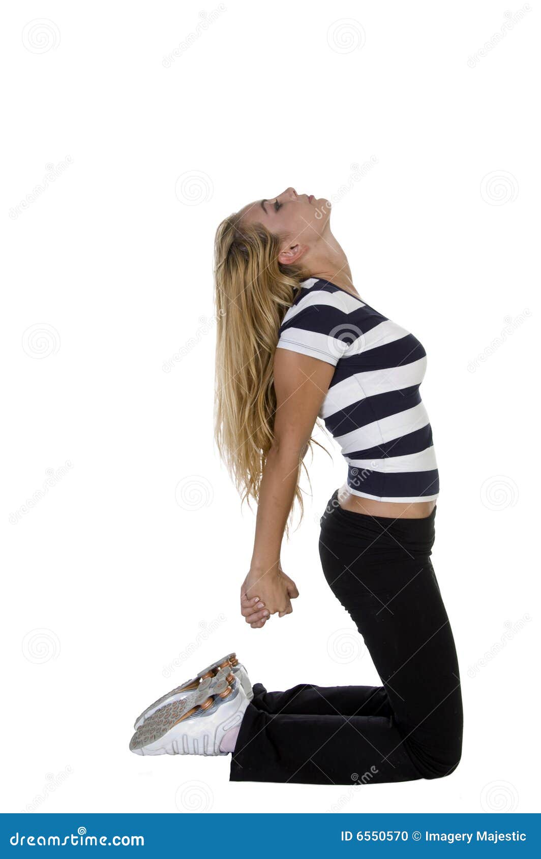 Lady With Clasped Hands Stretching Her Back Picture. Image: 6550570