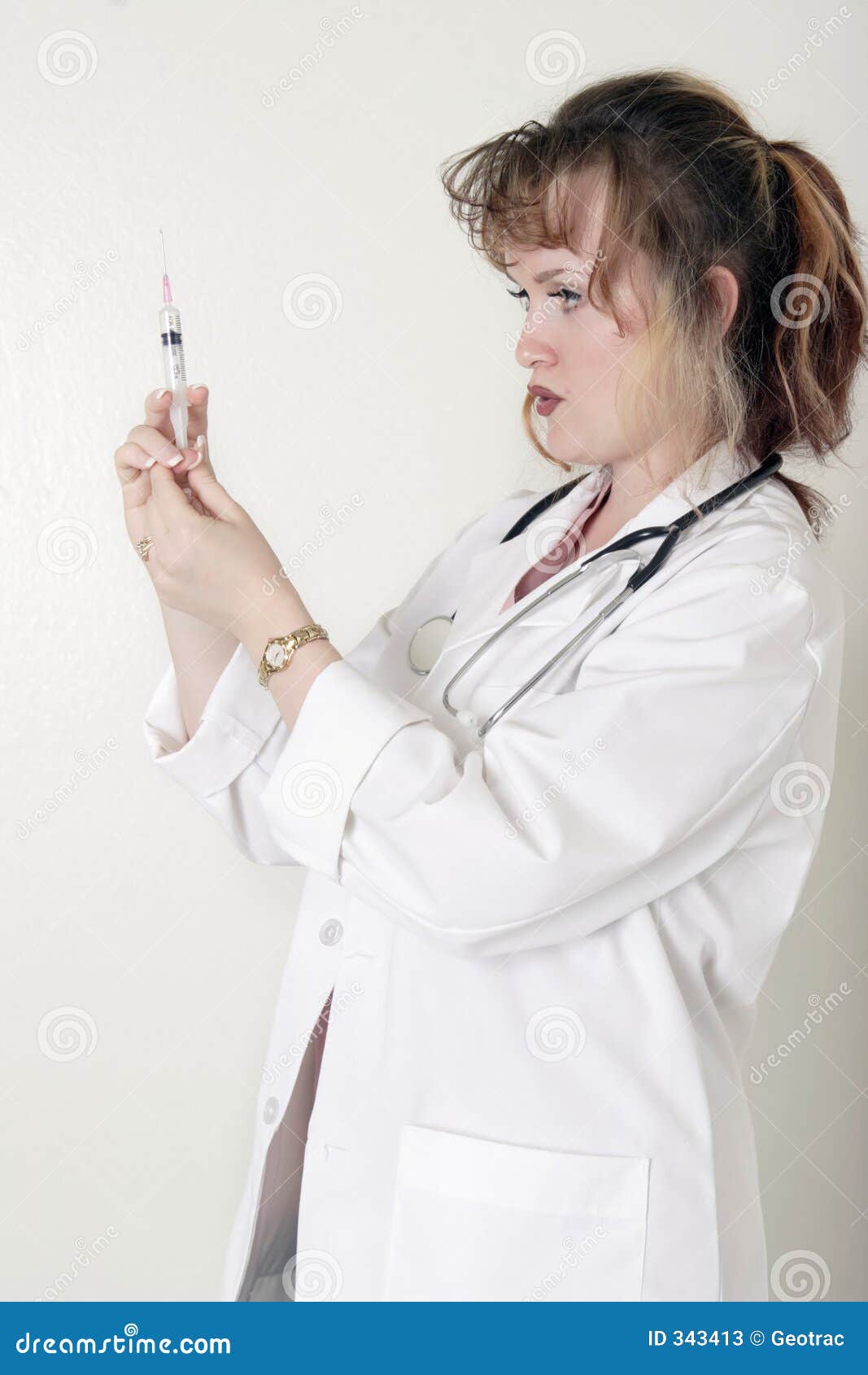 Lady Doctor Prepping Up a Syringe Stock Image - Image of career, doctor ...