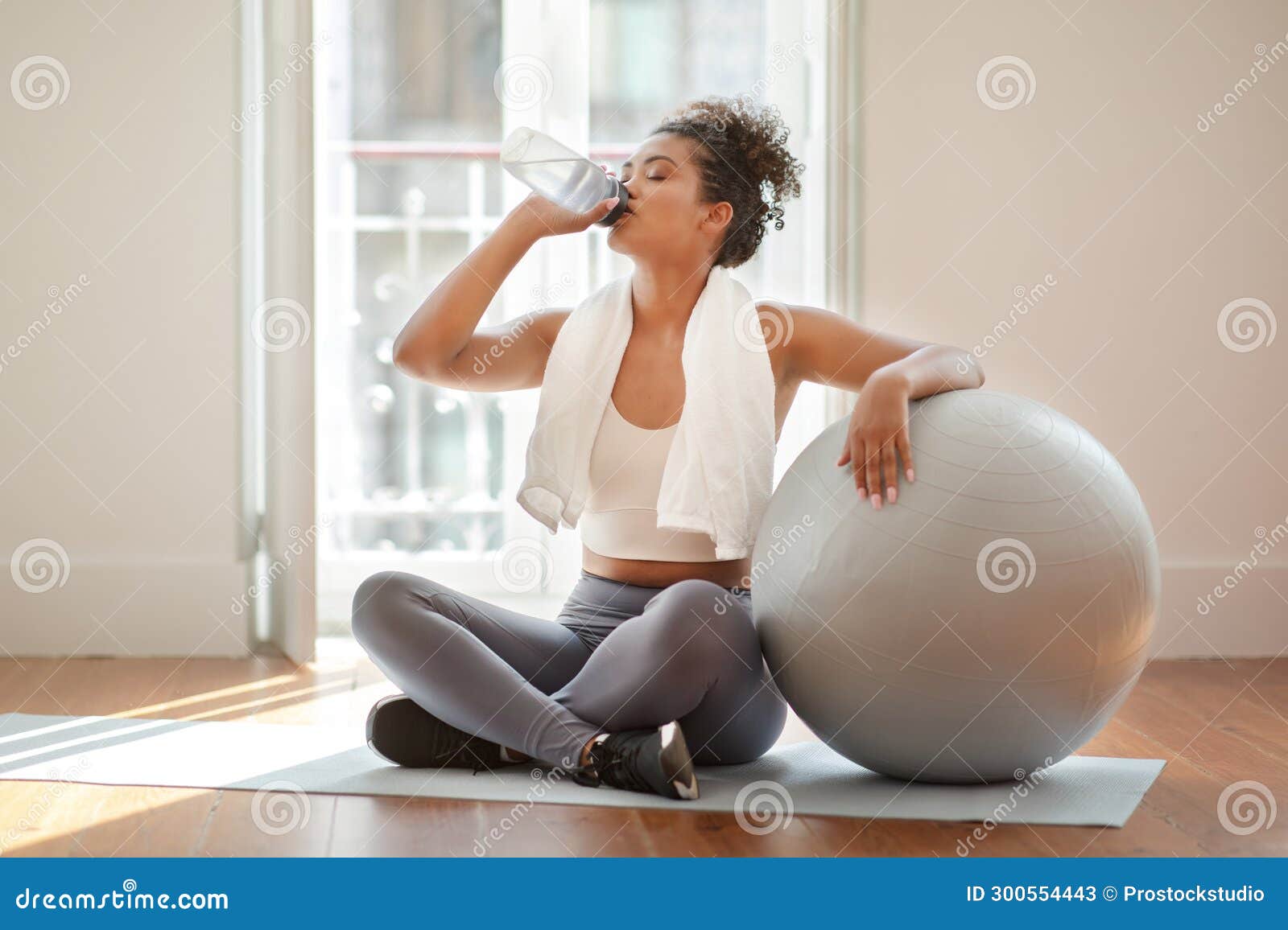 Lady Drinking Water Having Hydration Break during Workout at Home Stock ...