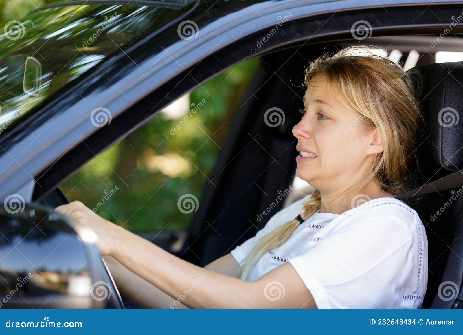 Lady Driver with Fearful Expression Trying To Slow Down Stock Photo ...