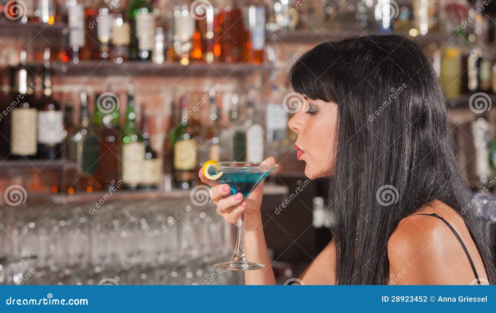 Lady Enjoying Her Martini stock photo. Image of alone - 28923452