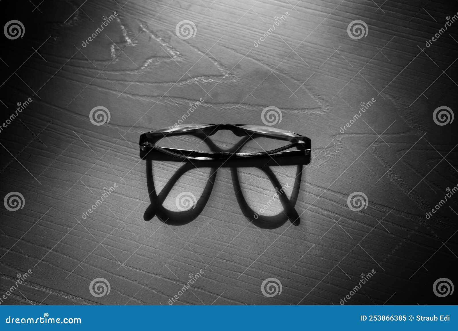 Lady eye glasses shadow stock image. Image of table - 253866385