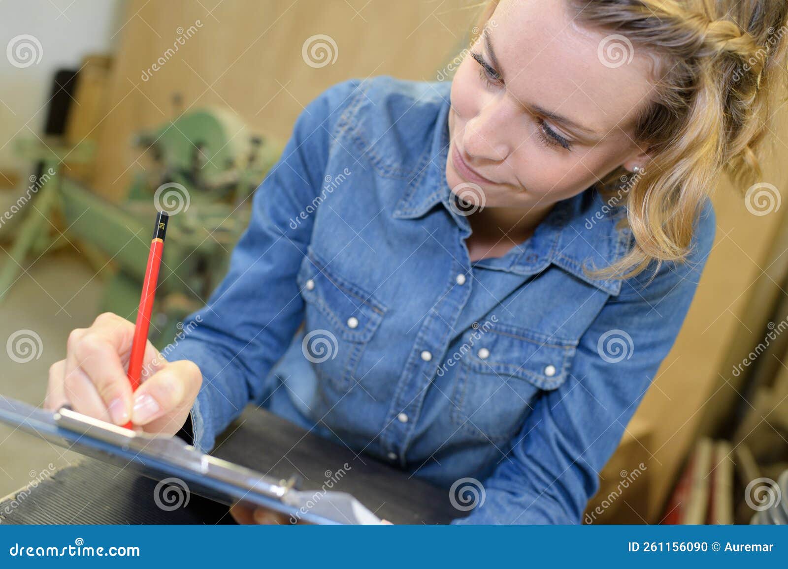 Lady Filling in Paperwork on Clipboard Stock Photo - Image of note ...