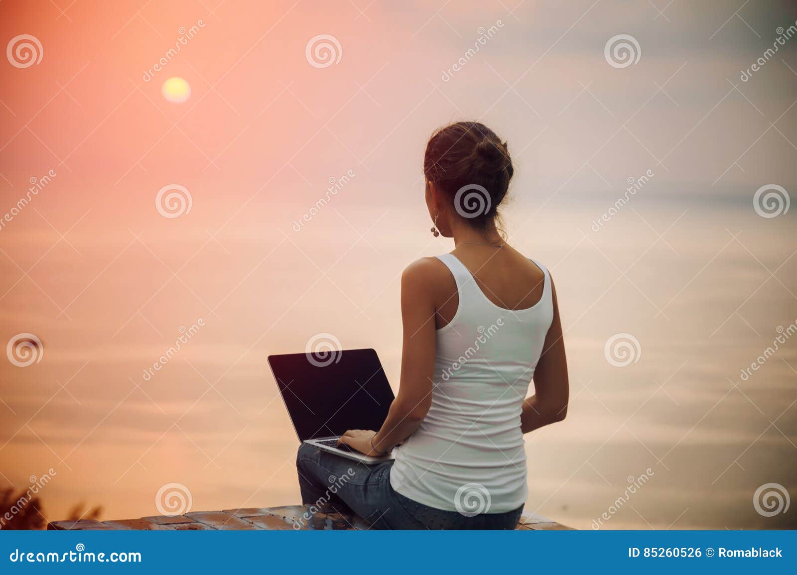 Lady Freelancer with Laptop on Sunset Stock Photo - Image of ocean ...