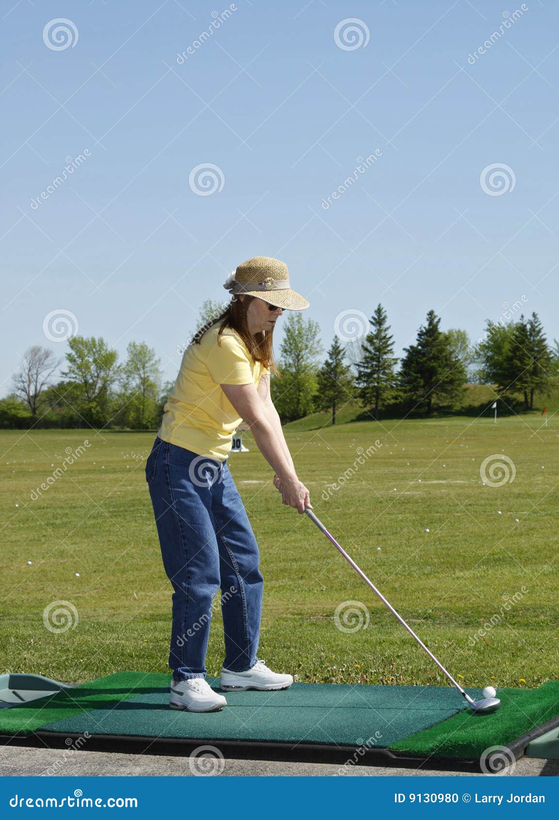 Lady at Golf Driving Range stock photo. Image of range - 9130980
