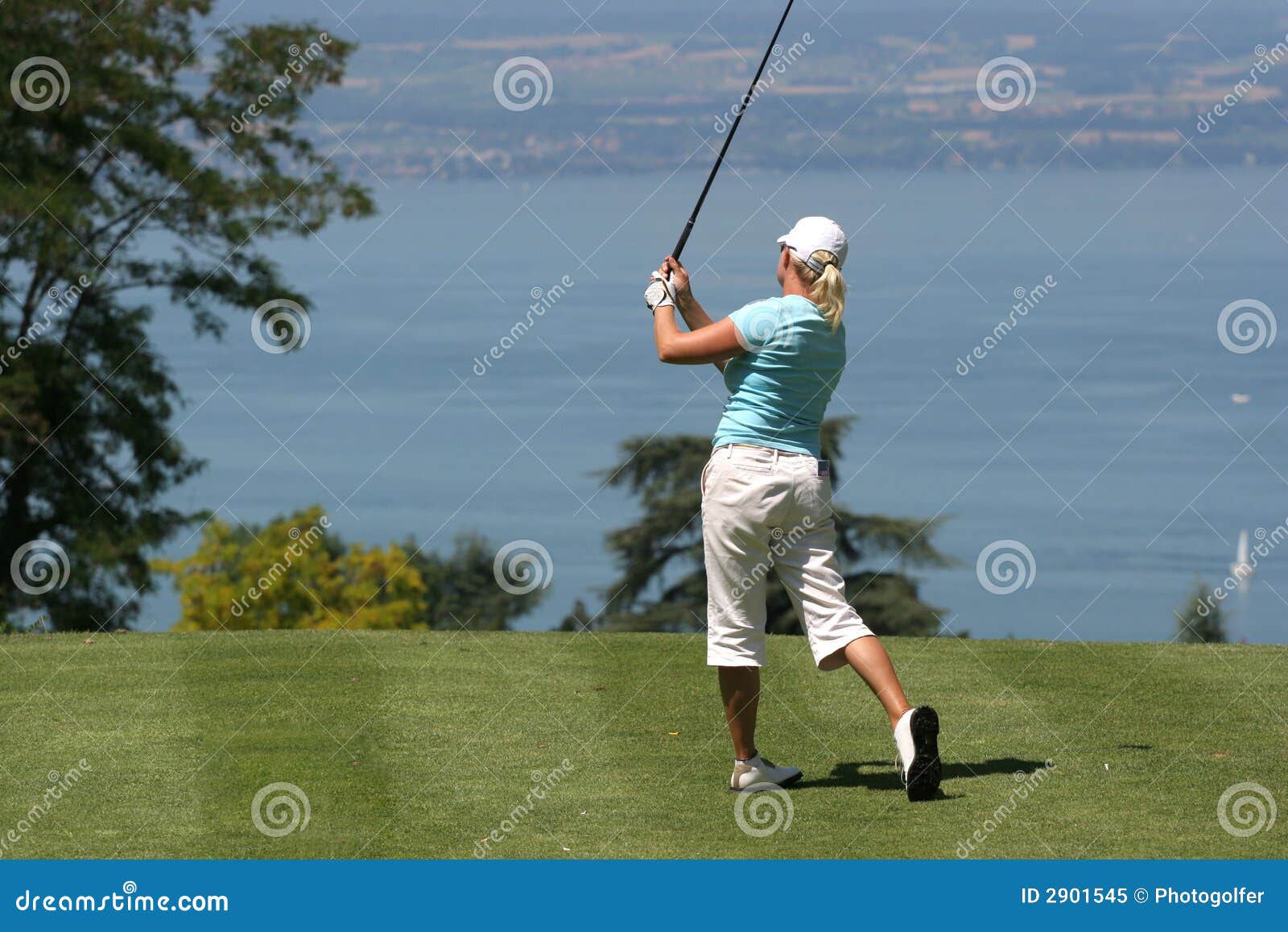 Lady Golf Swing at Leman Lake Stock Image - Image of sunshine, golfer ...