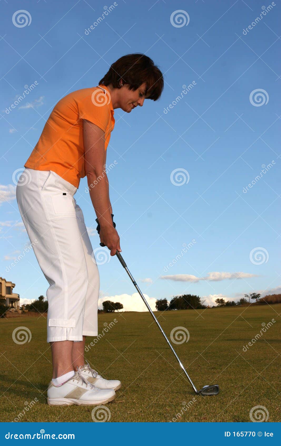 Lady Golfer stock photo. Image of club, clouds, female - 165770