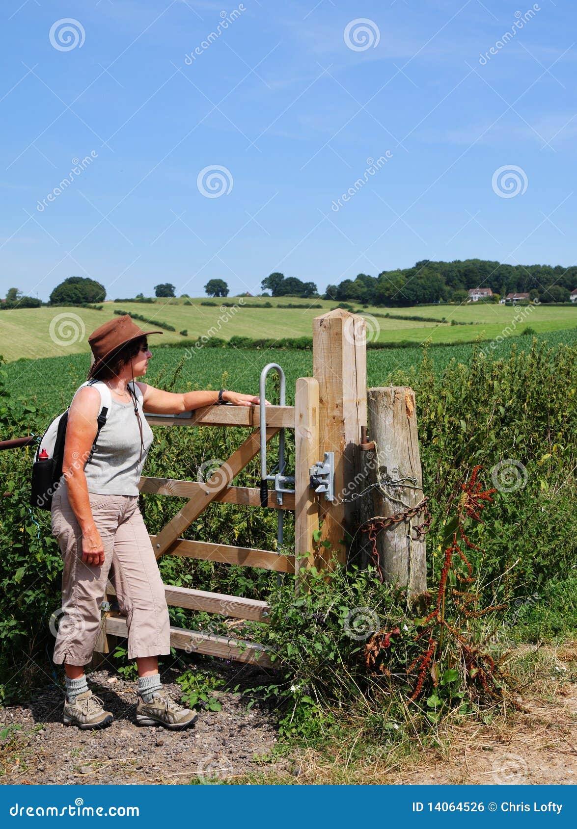 Lady Hiker Standing by a Gate Stock Photo - Image of hiking, activity ...