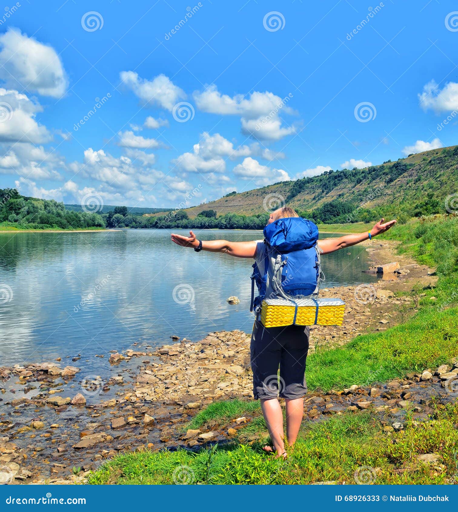 Lady Hiker Standing on the Grass and Enjoying View of the River Stock ...