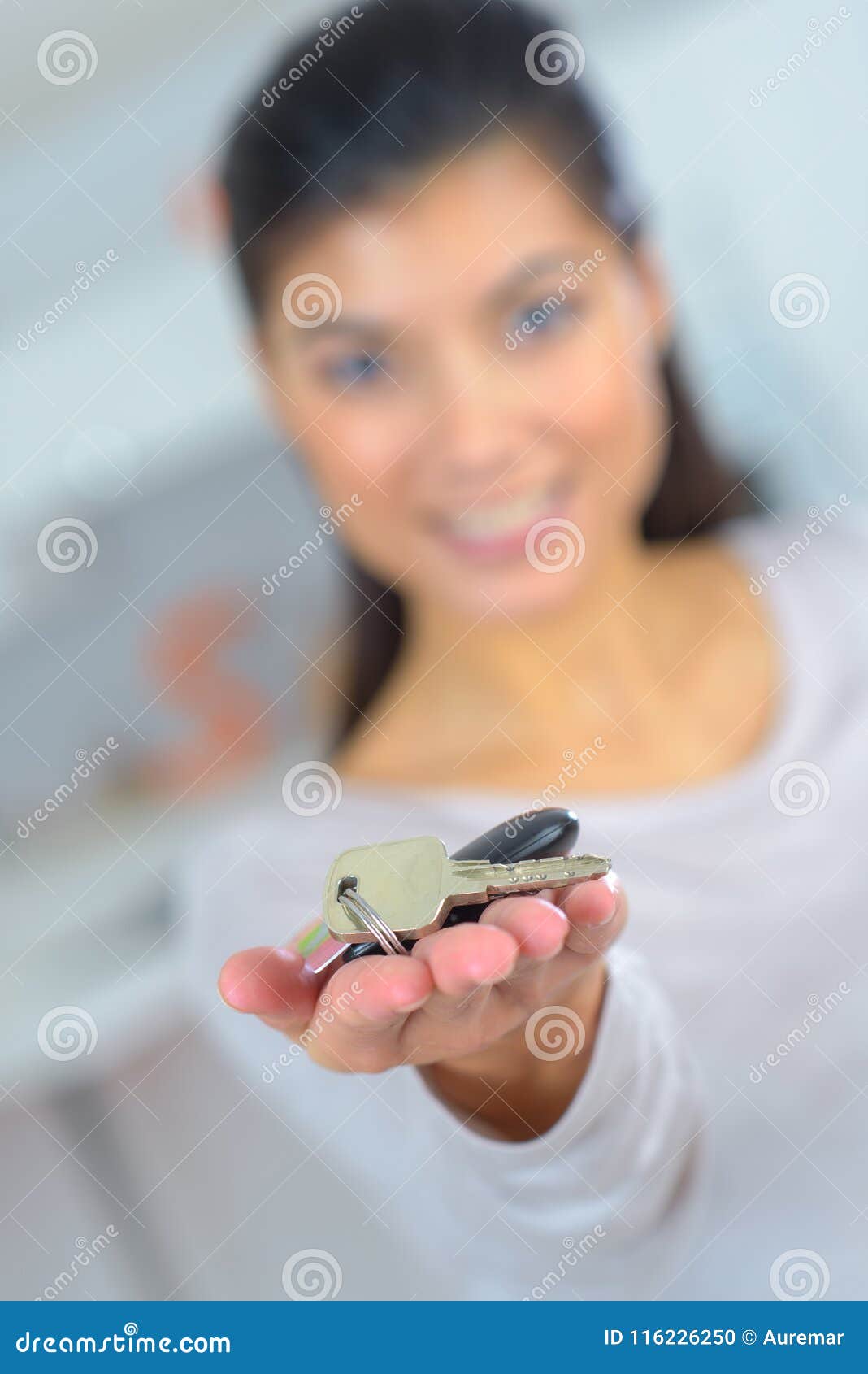 Lady Holding Keys in Outstretched Hand Stock Photo - Image of selling ...