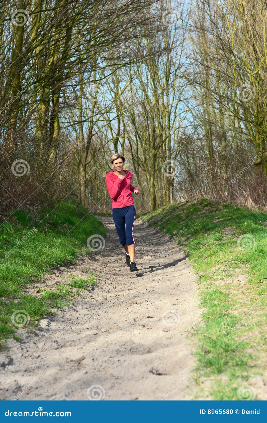 Lady Jogging in a Park stock photo. Image of quick, nature - 8965680