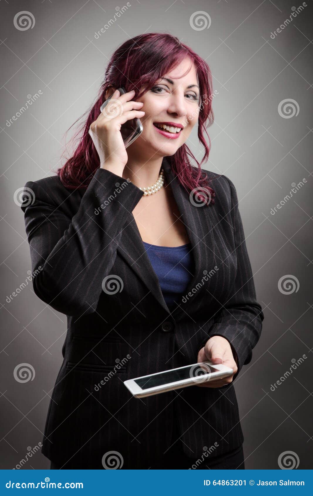 Lady multi tasking stock image. Image of concentration - 64863201