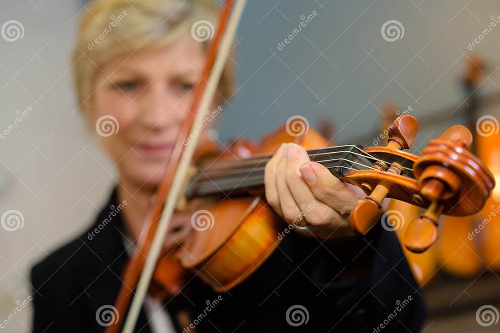 Lady Playing Stringed Instrument Stock Photo - Image of violinist ...