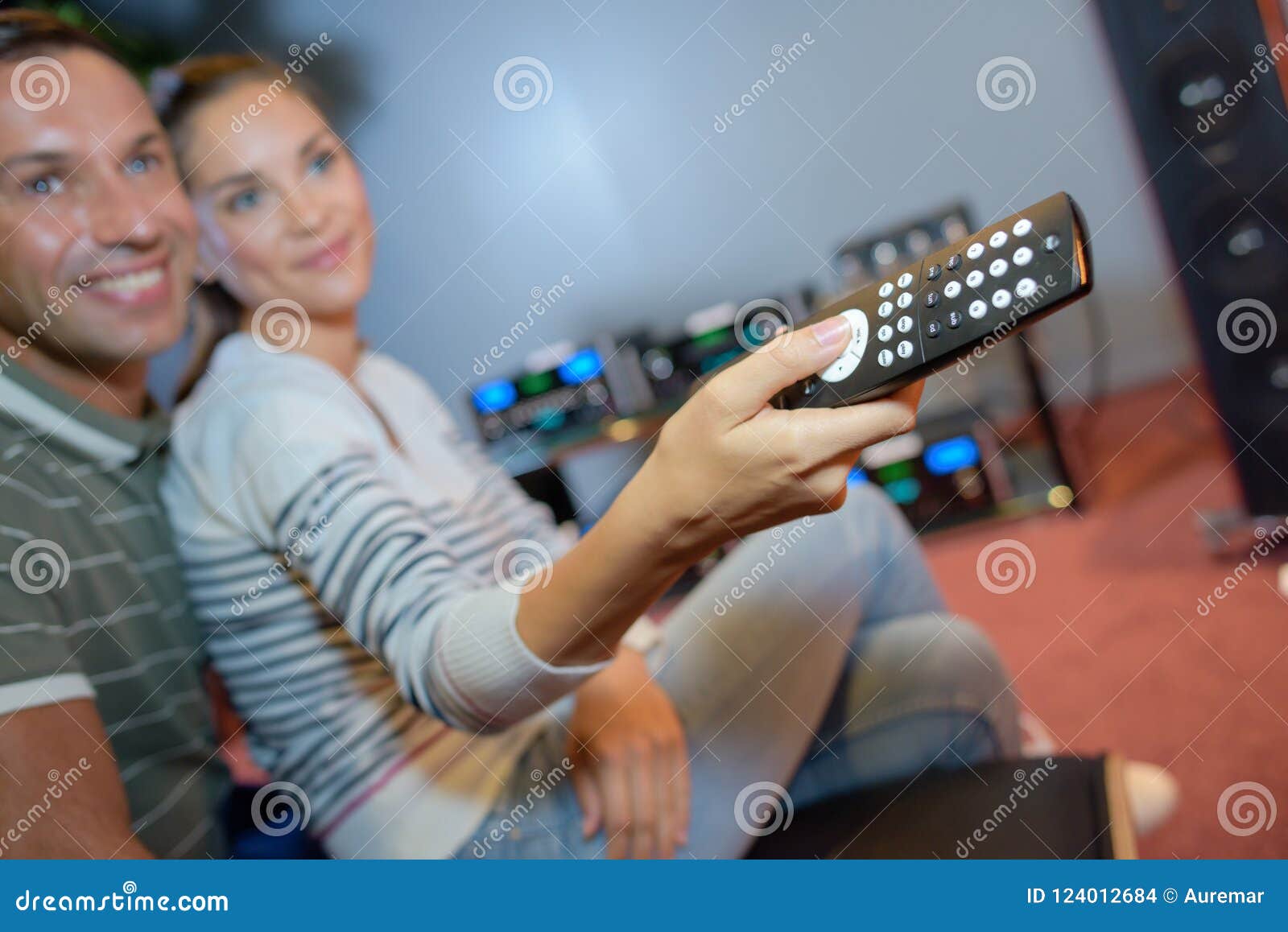 Lady Pressing Remote Control Stock Photo - Image of serene, relaxation ...