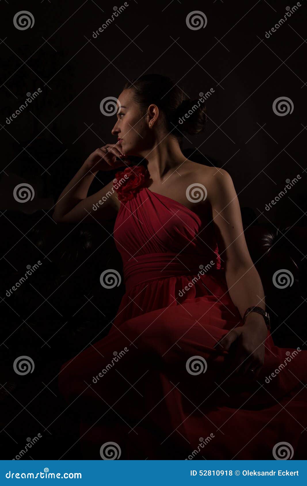 Lady in red in a dark room stock photo. Image of fashion - 52810918
