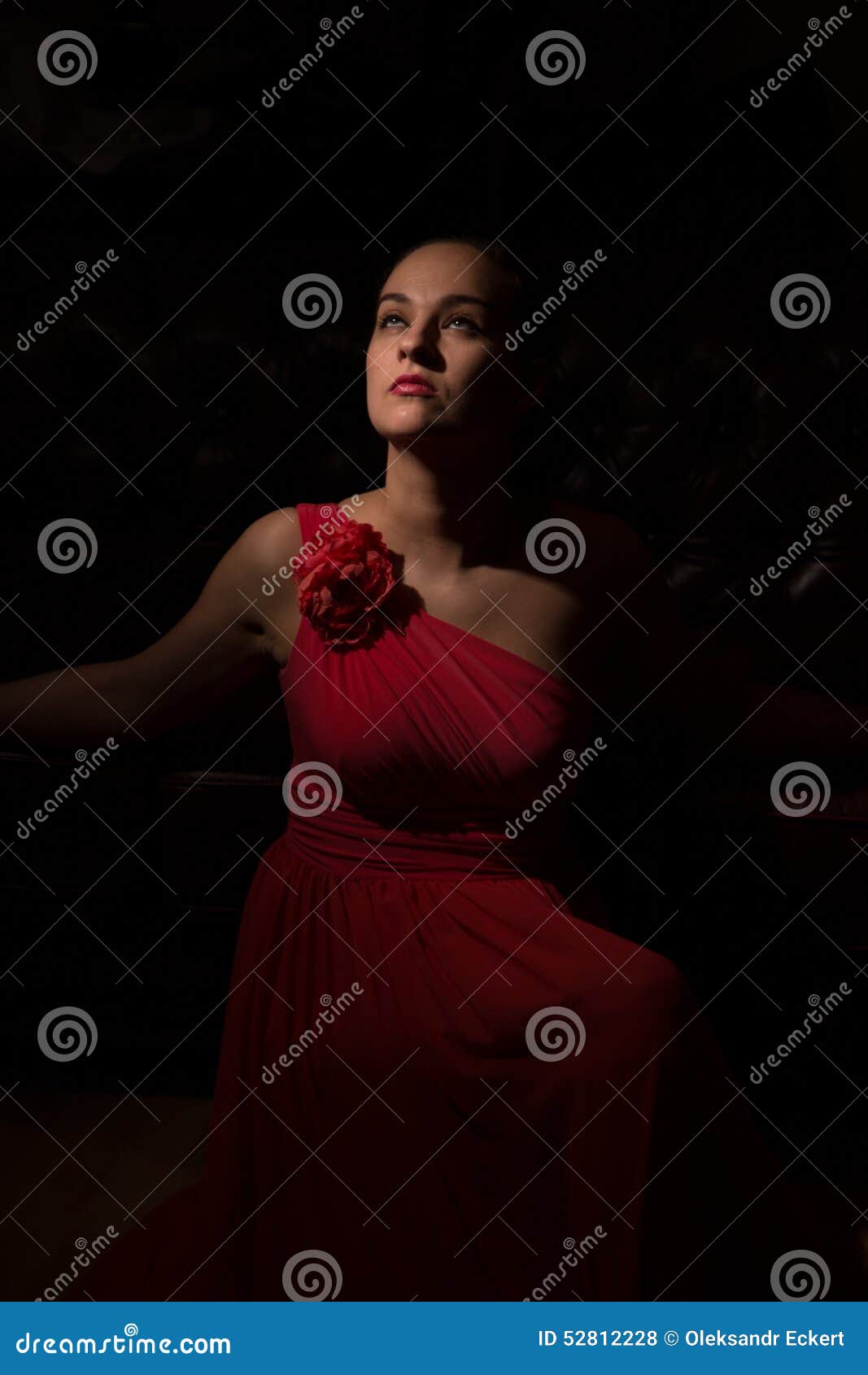 Lady in red in a dark room stock photo. Image of lady - 52812228