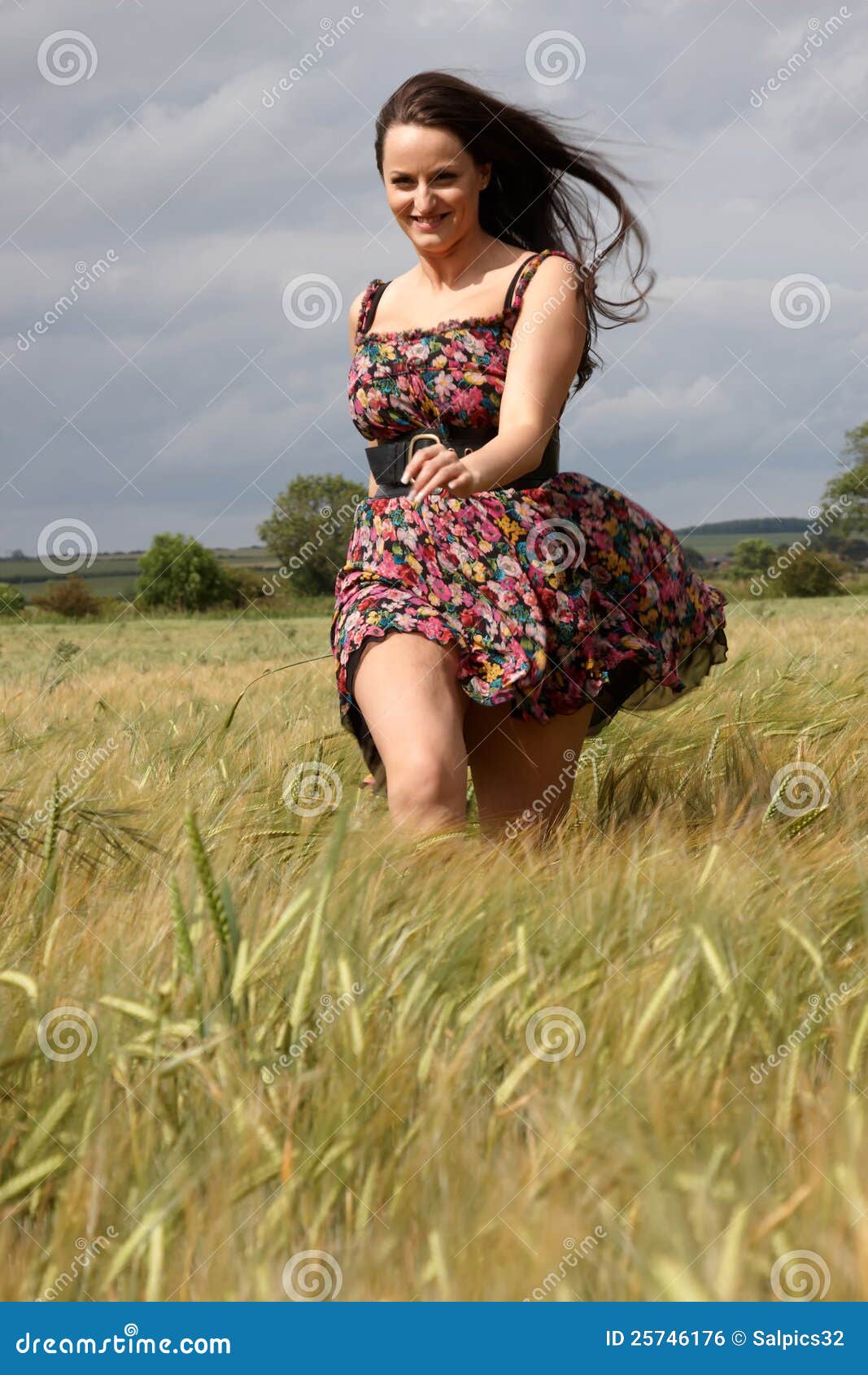 A Lady Running through a Corn Field Stock Photo - Image of trees ...