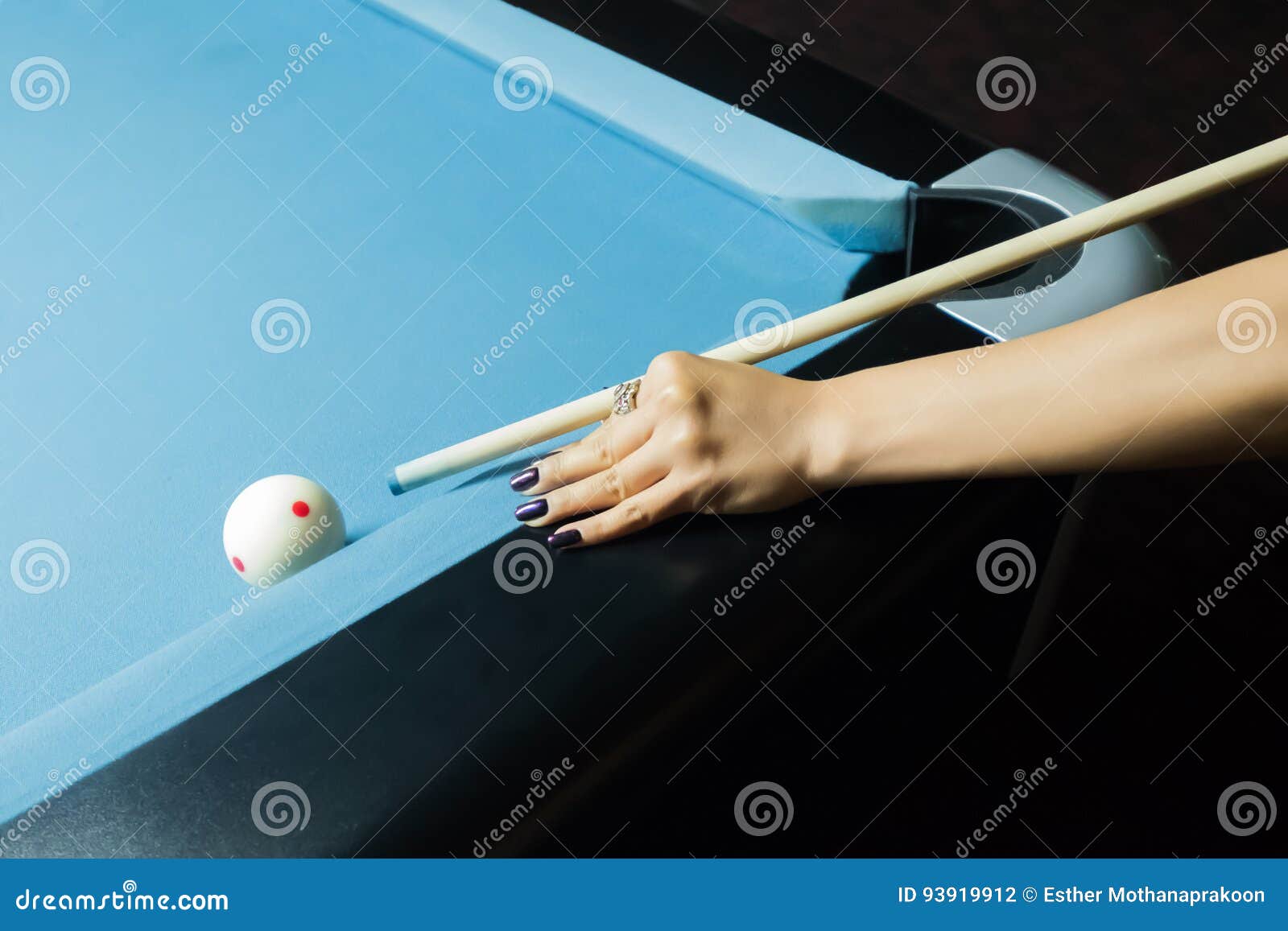 A Lady`s Hand Putting on the Pool Table, Aiming on the White Bal Stock ...