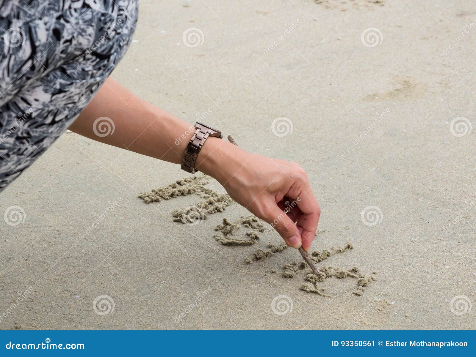 A Lady`s Hand Writing Word `HELLO` on the Sand at the Beach Stock Image ...