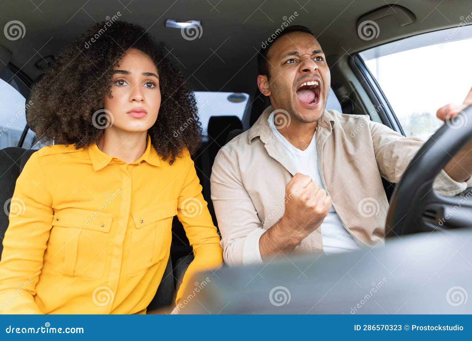 Lady Sitting In Car With Driver Speeding And Gesturting Yes Stock Image