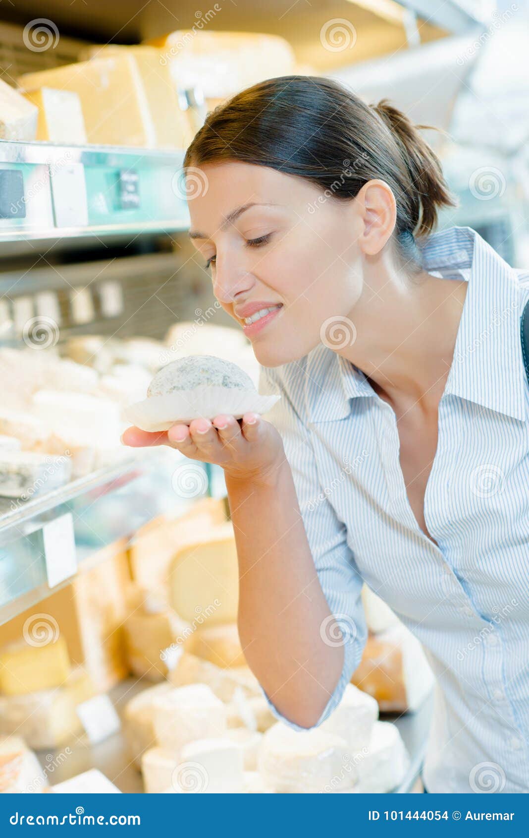 Lady Smelling Cheese in Shop Stock Photo - Image of woman, person ...